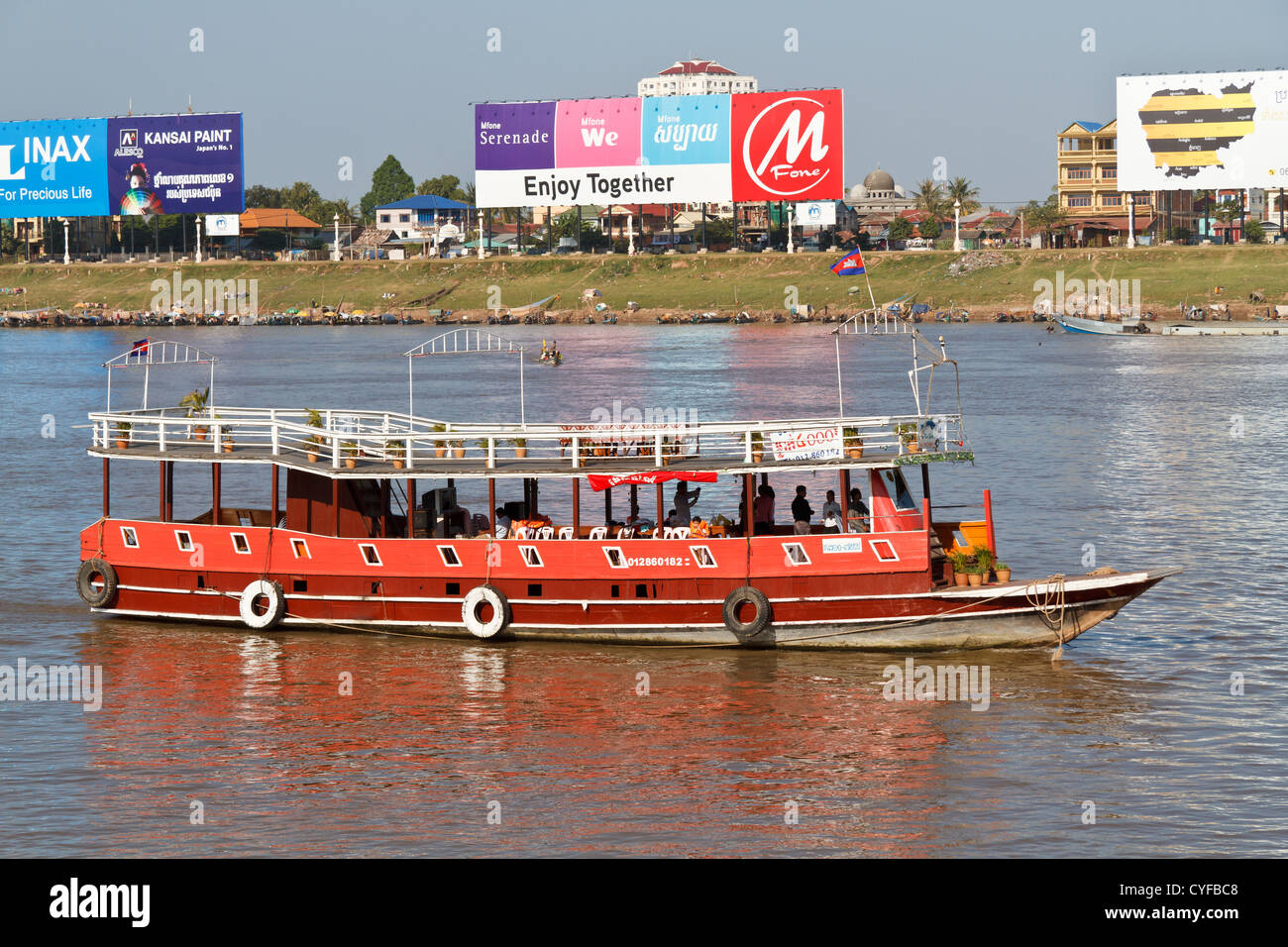 Tourist Boat on the River Tonle Sap in Phnom Penh, Cambodia Stock Photo ...
