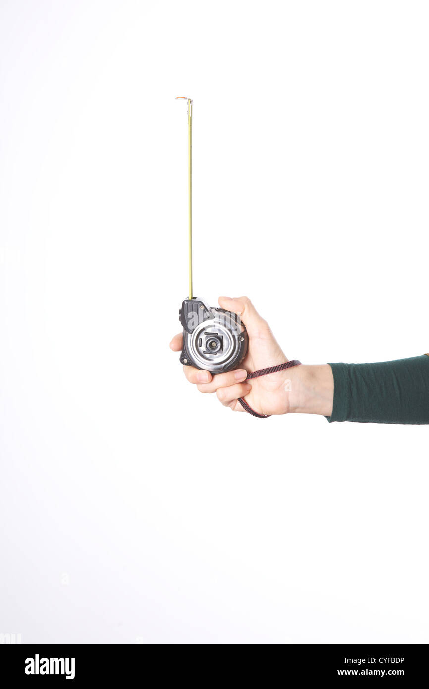 woman detail holding a yellow meter in her hand Stock Photo - Alamy