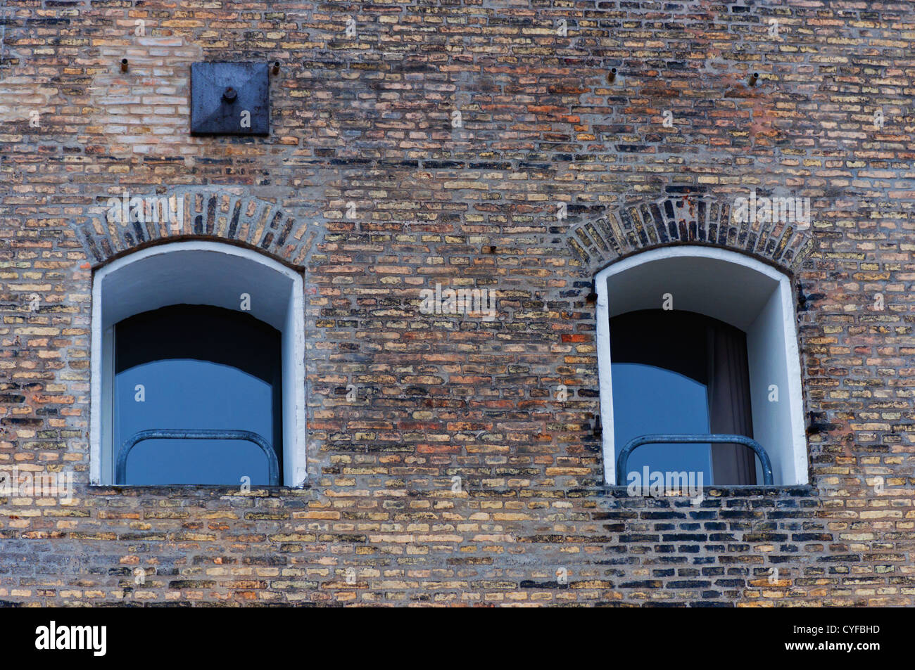 Brick wall windows flower hi-res stock photography and images - Alamy