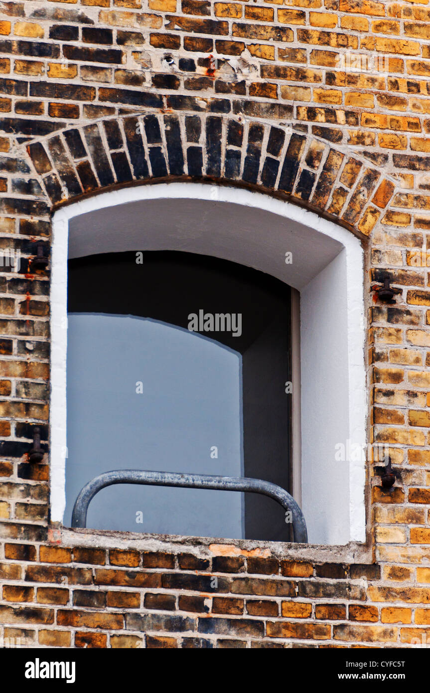 Window on brick background Stock Photo - Alamy