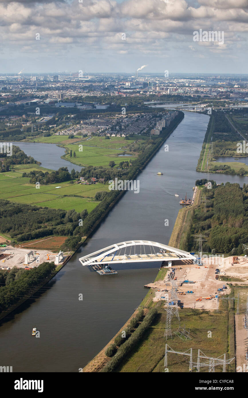 The Netherlands, Amsterdam, placement of prefabricated bridge over ...