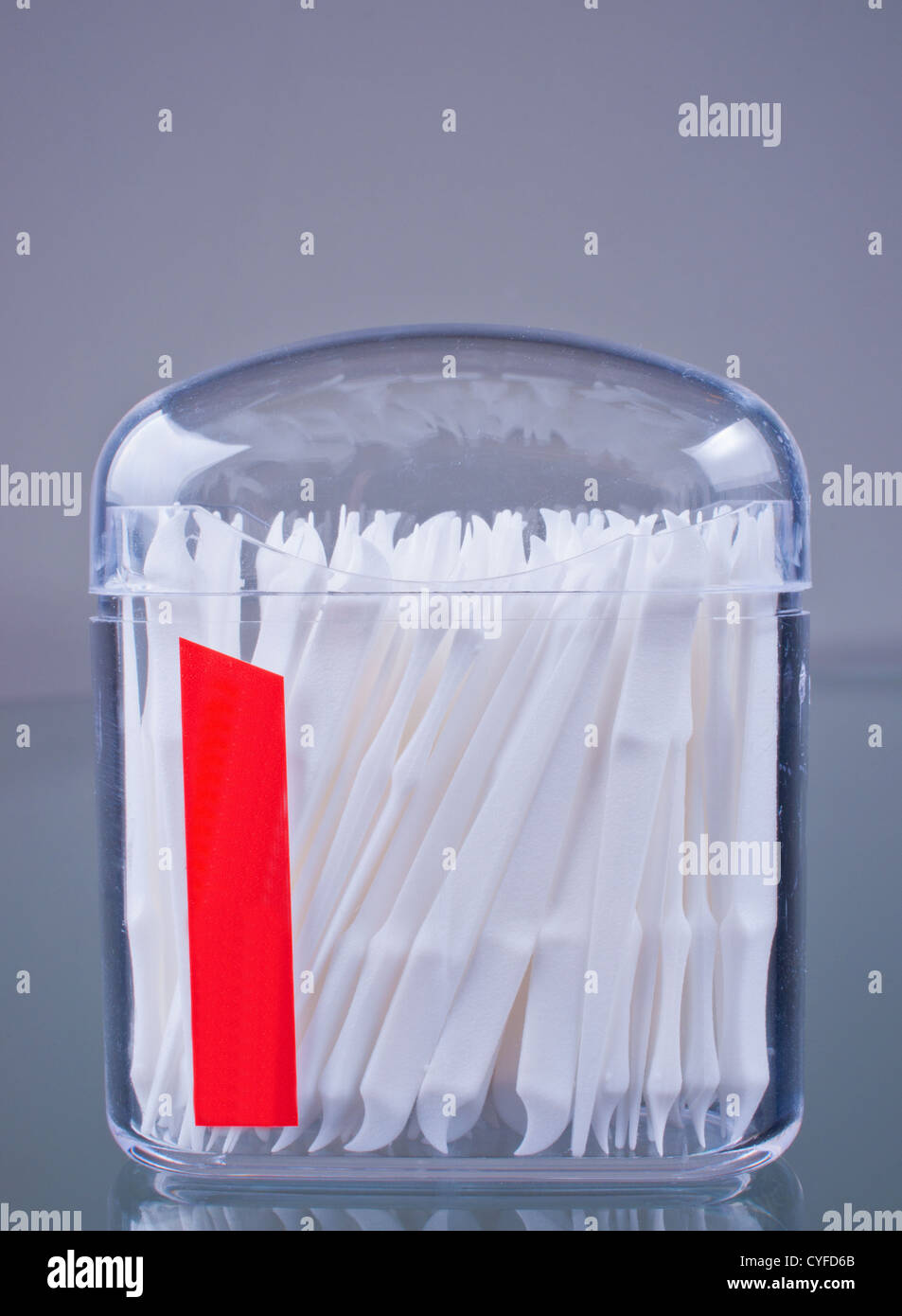 Plastic toothpicks in clear plastic container on grey background Stock ... Plastic toothpicks in clear plastic container on grey background Stock ...