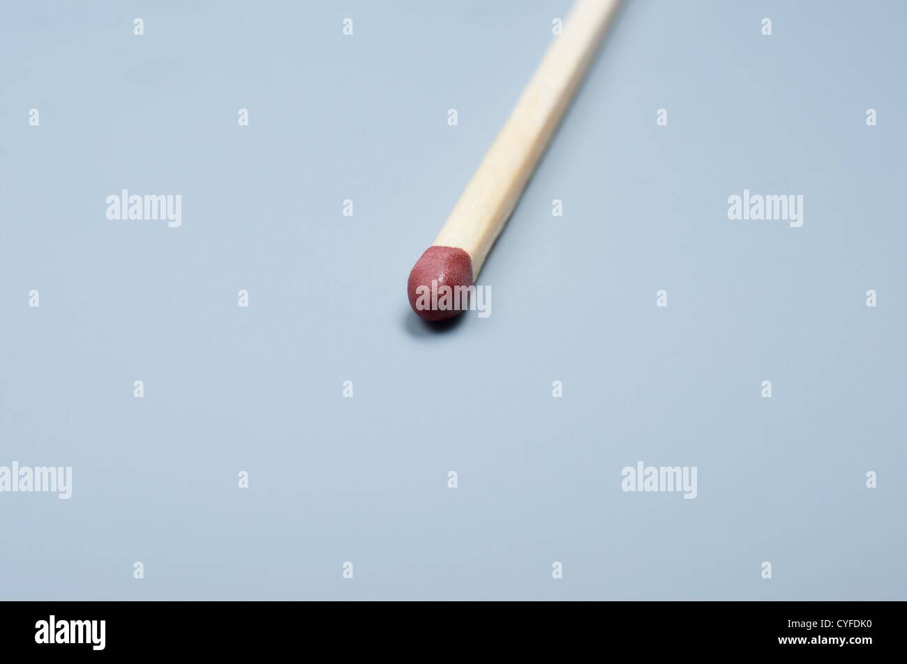 Fireplace match with red head close up Stock Photo - Alamy