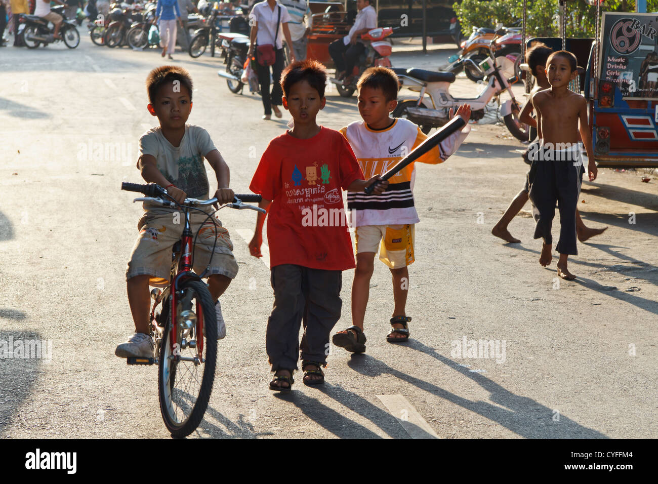 Street Kids playing in the Street in Phnom Penh, Cambodia Stock Photo ...
