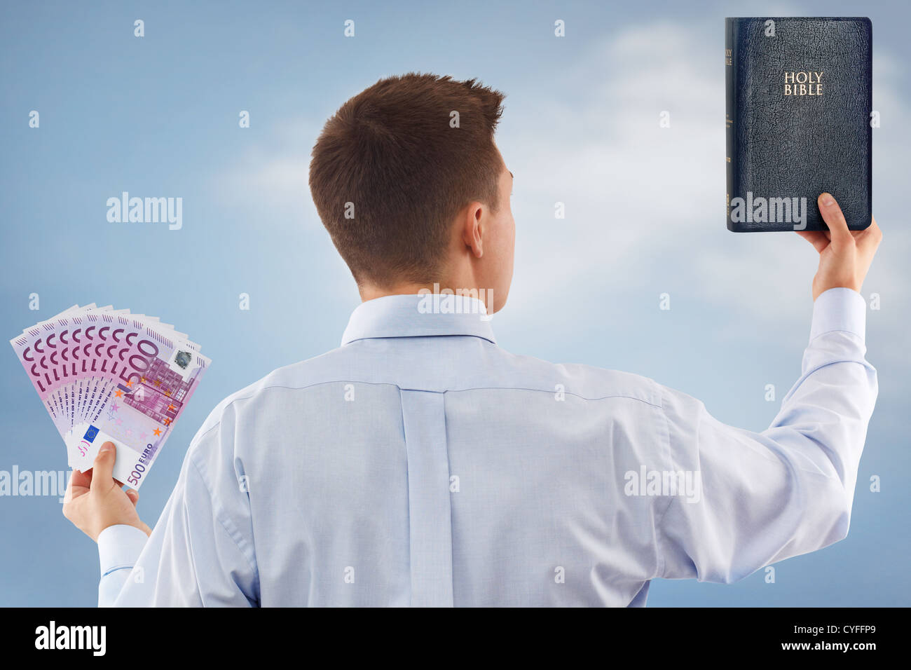 Young man choosing between God and money (euro variant Stock Photo - Alamy