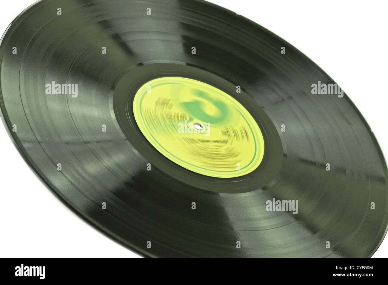 turning vinyl record on white background Stock Photo - Alamy
