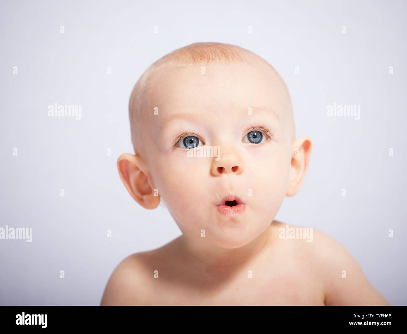 little baby makes a puzzled expression Stock Photo - Alamy