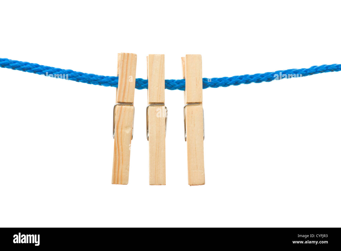 Three pegs hanging in a rope, white isolated background Stock Photo - Alamy