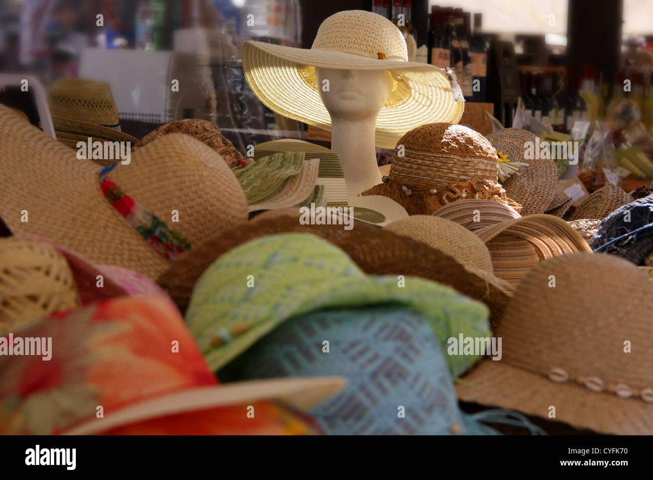 Colorful Straw hats at a market stall at the Piazza delle Erbe in ...