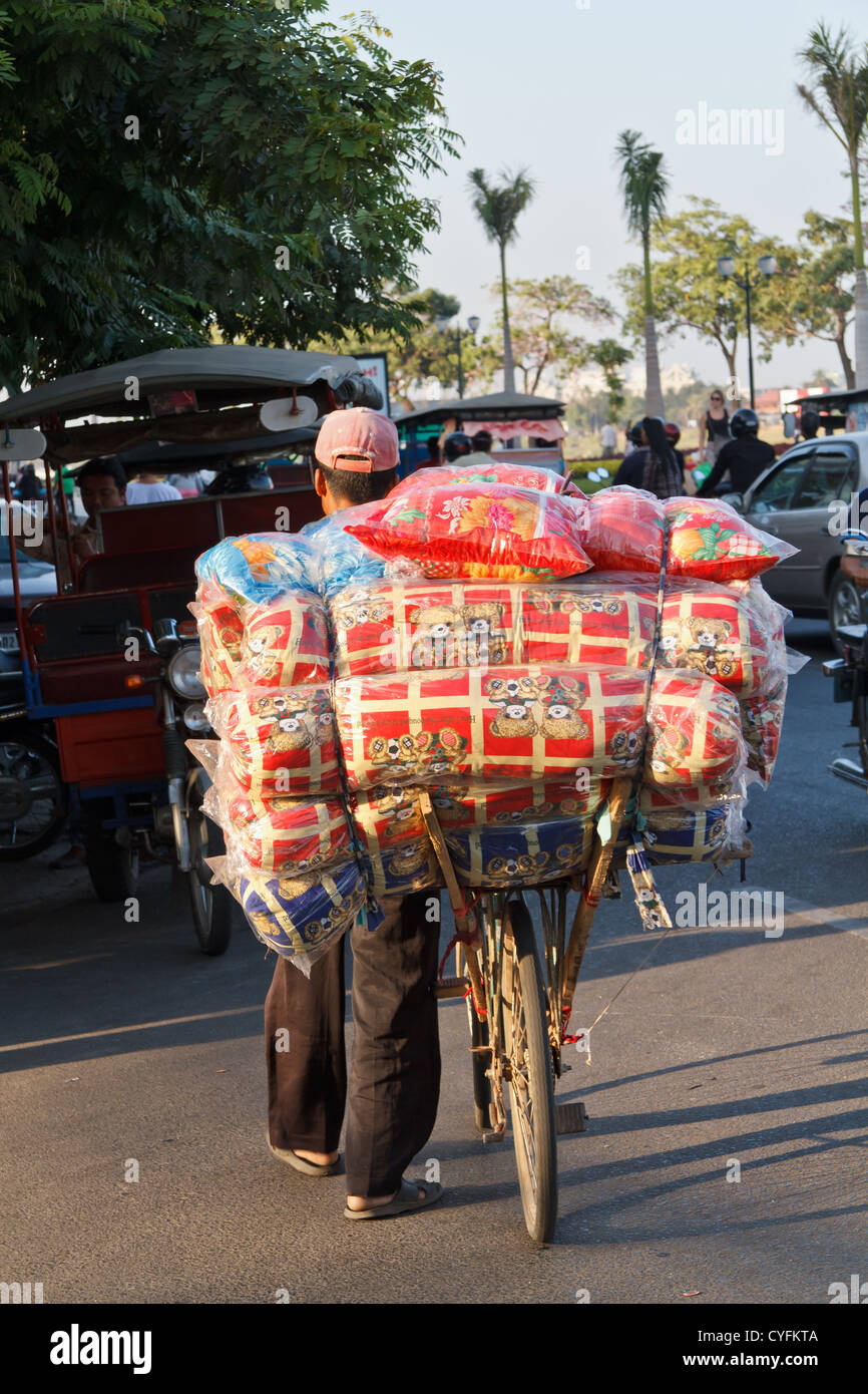 Overloaded Bicycle in Phnom Penh, Cambodia Stock Photo - Alamy