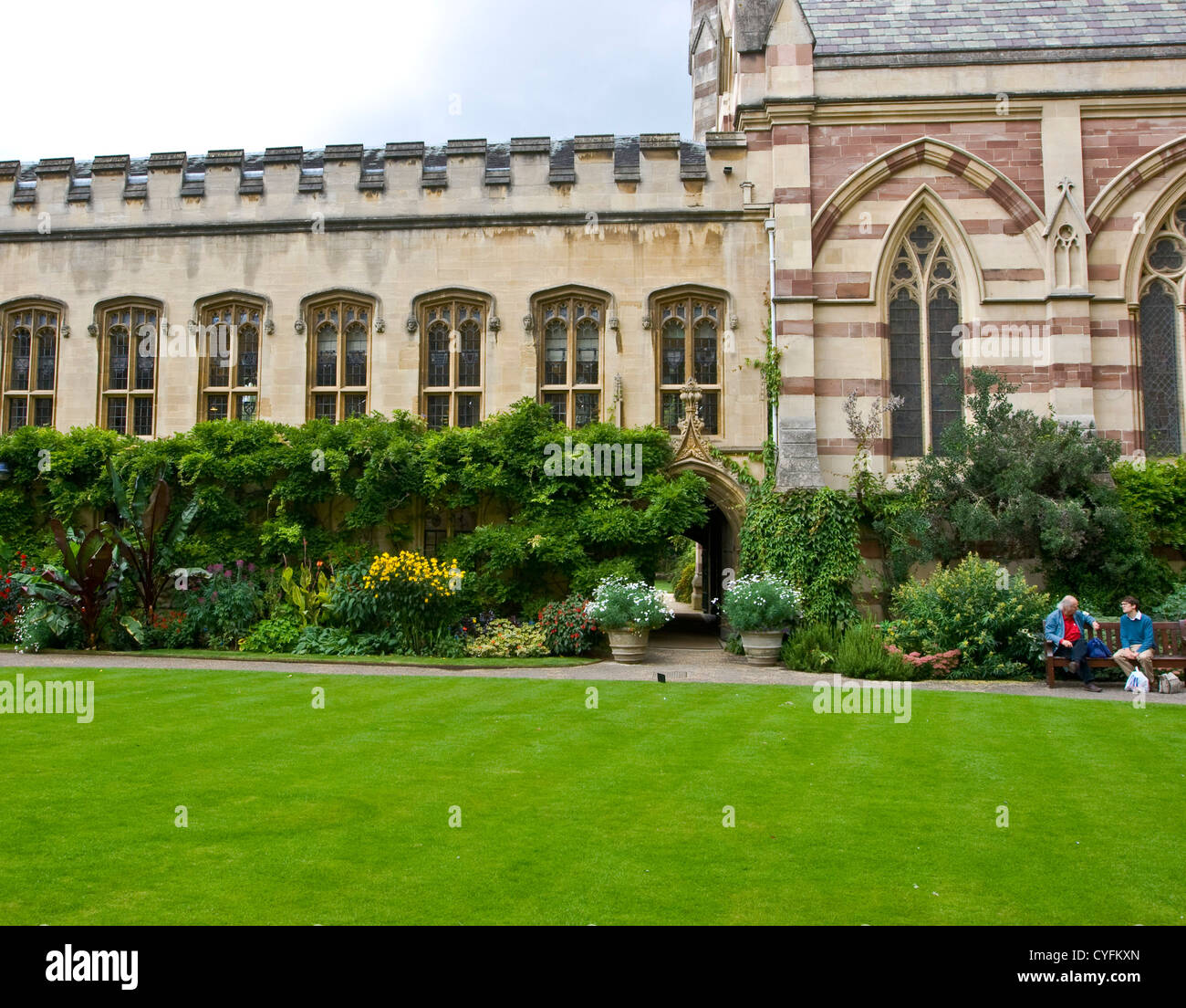 Two people sitting in front quadrangle gardens Balliol College and ...