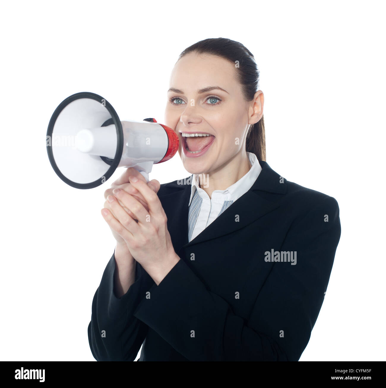 Pretty lady giving instructions with megaphone against white background ...