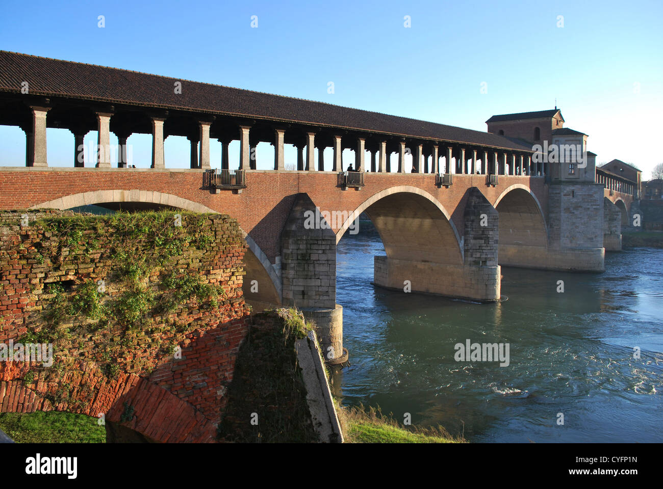 Old covered bridge on Ticino river in Pavia, Lombardy, Italy Stock ...