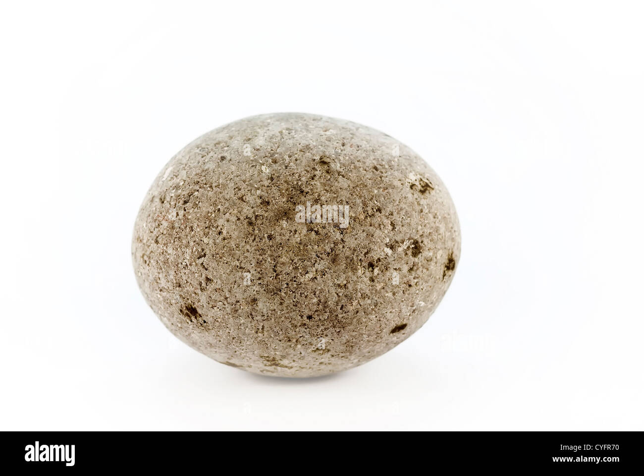 a single, stone on white background Stock Photo - Alamy