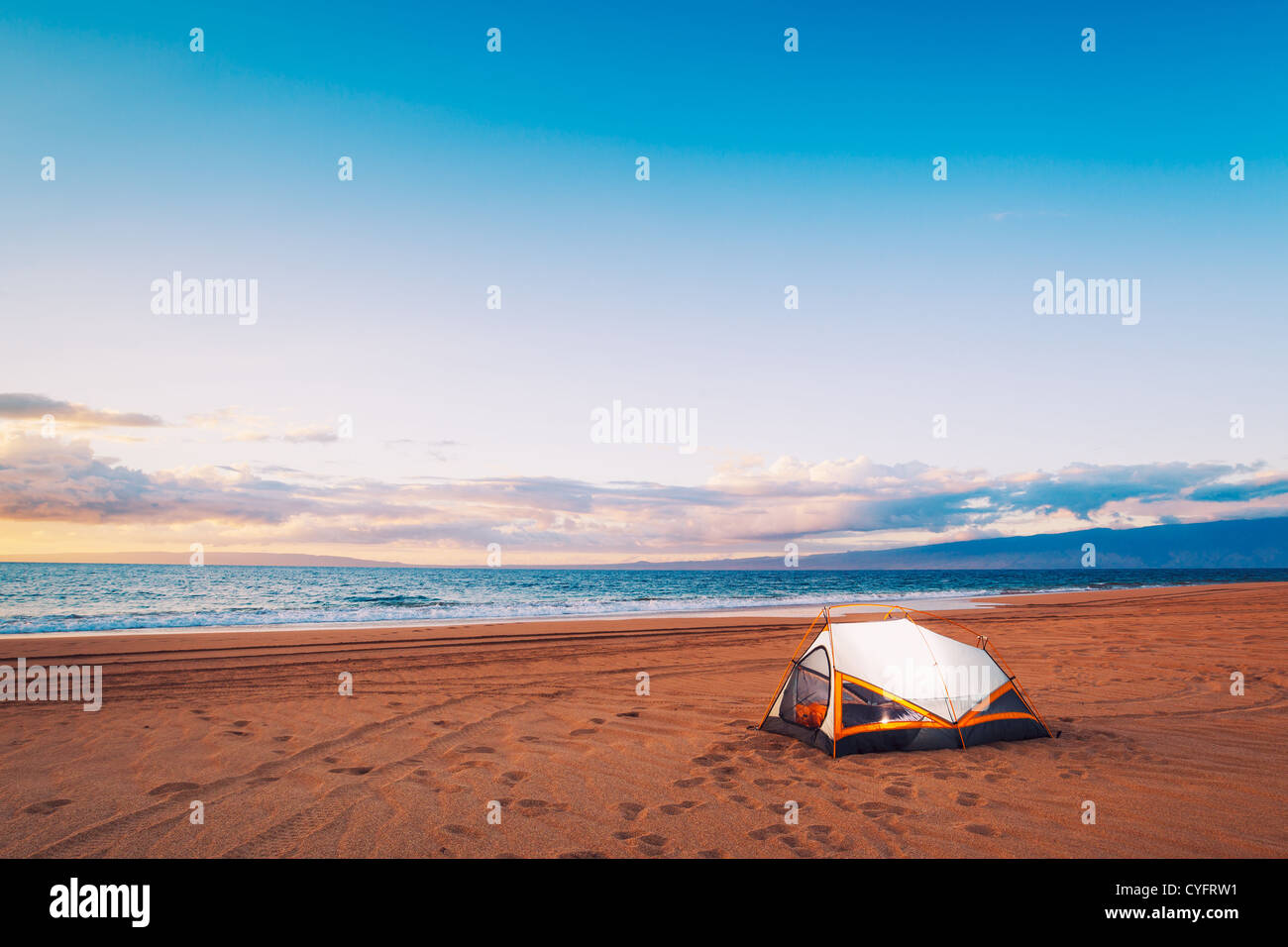 Camping on the Beach at Sunset Stock Photo - Alamy