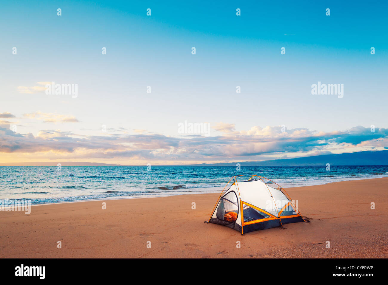 Camping on the Beach at Sunset Stock Photo - Alamy