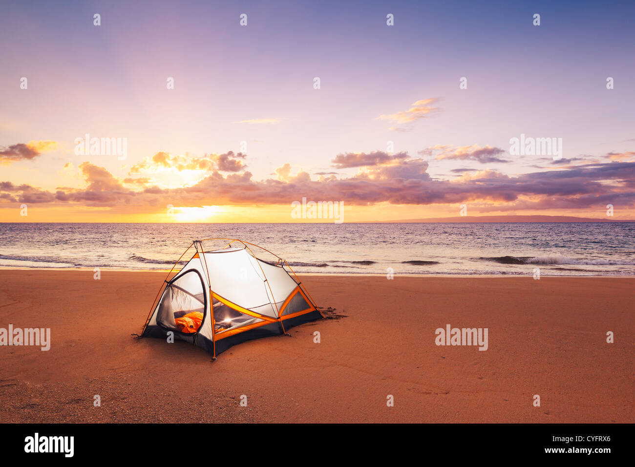 Camping on the Beach at Sunset Stock Photo - Alamy