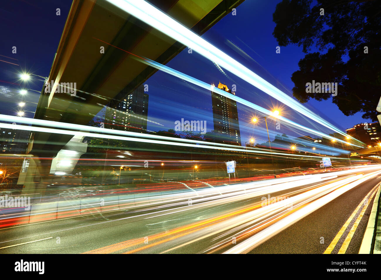 city in night with busy traffic Stock Photo - Alamy