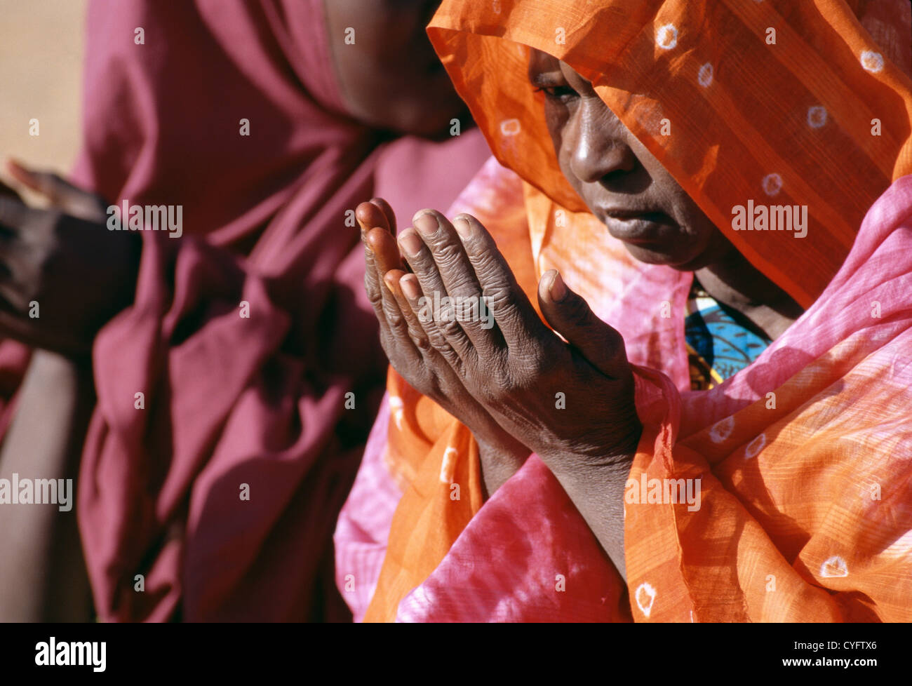 Mali, Gao, Sahara desert, Sahel, Near Niger river, Woman praying at ...