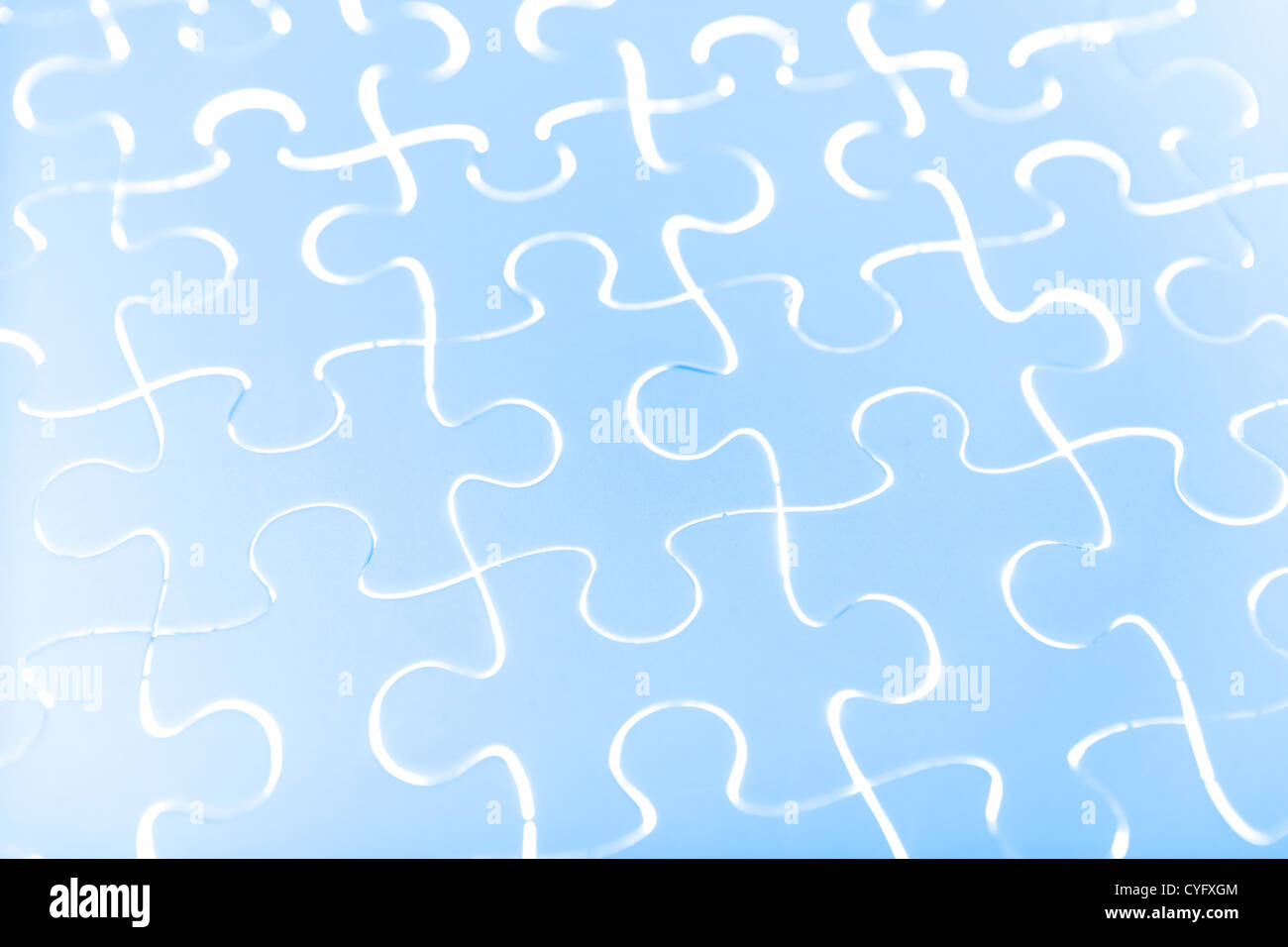 Puzzle in blue Stock Photo - Alamy