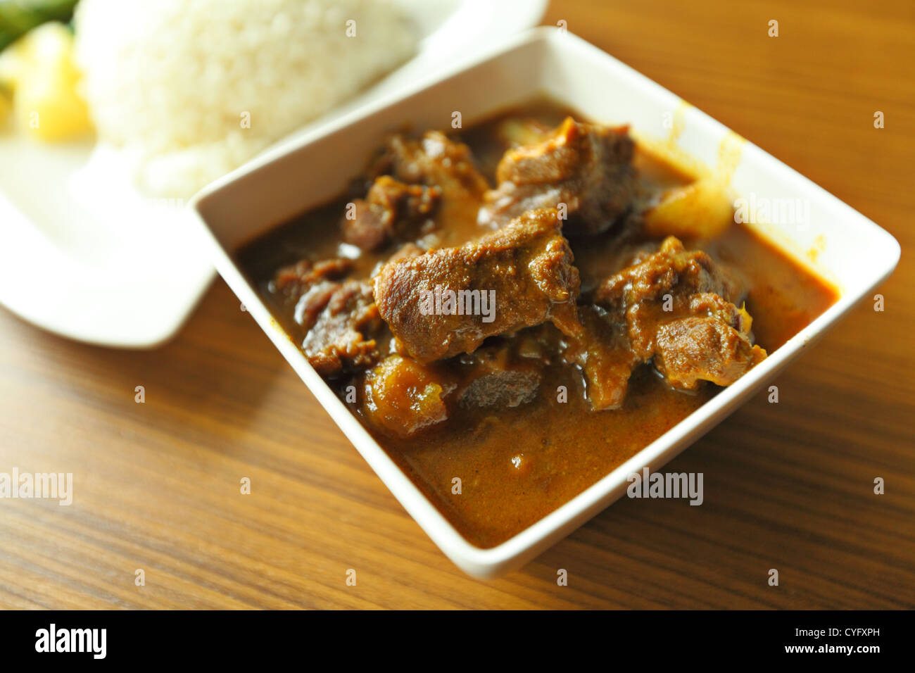 Meat curry with rice Stock Photo - Alamy
