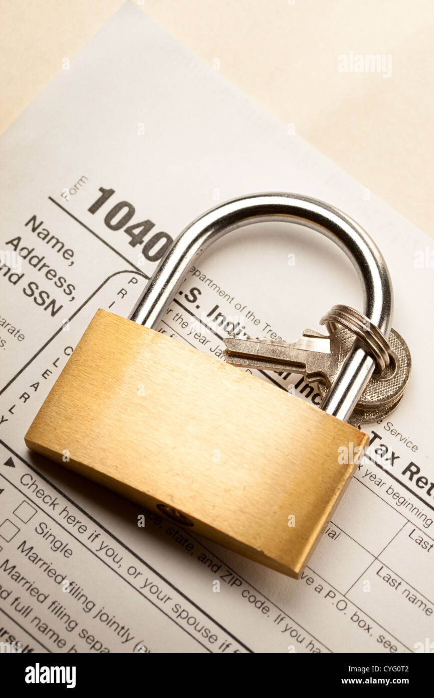 Tax form and key lock Stock Photo - Alamy