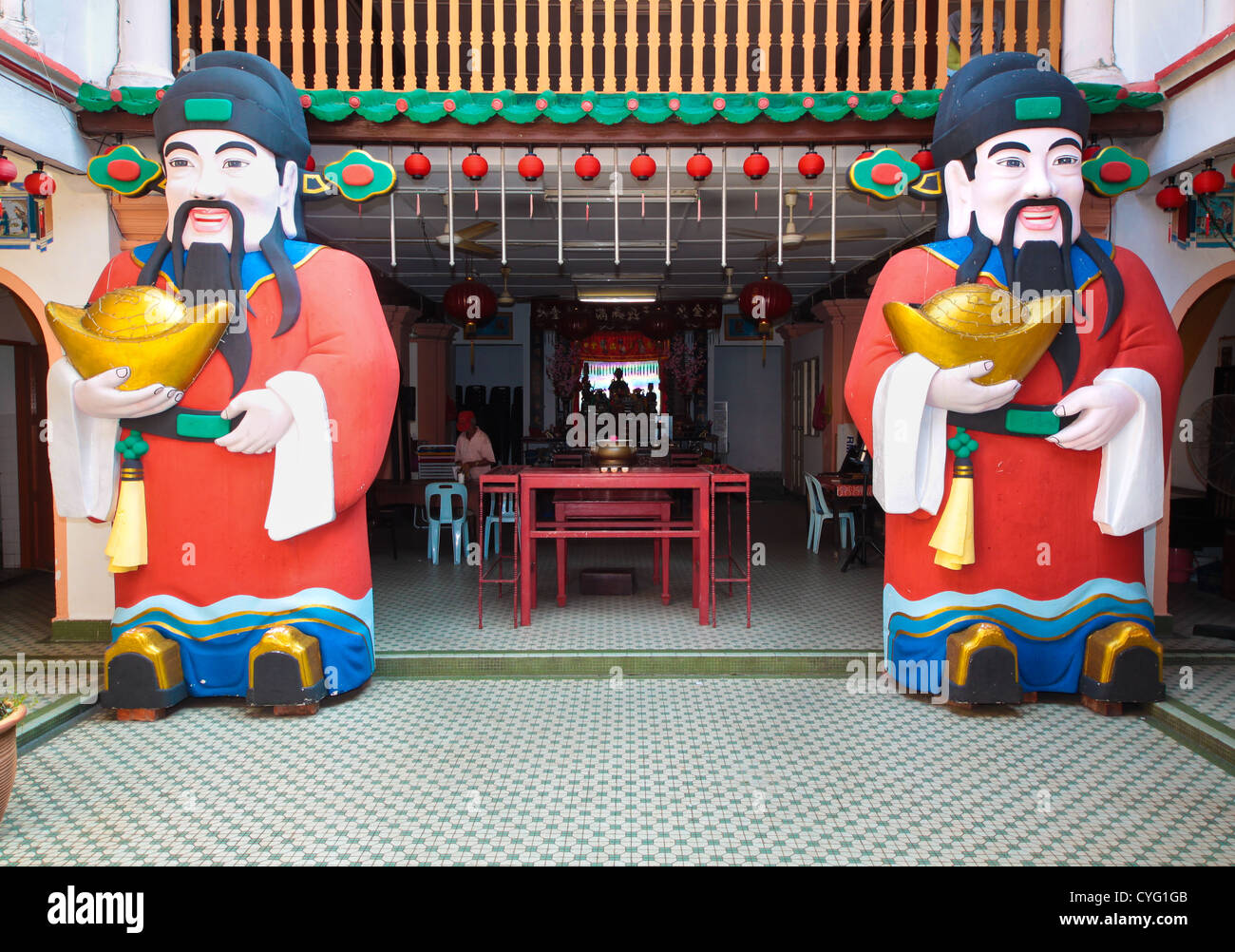 Pair of chinese religious statues inside a temple at Jonker street ...
