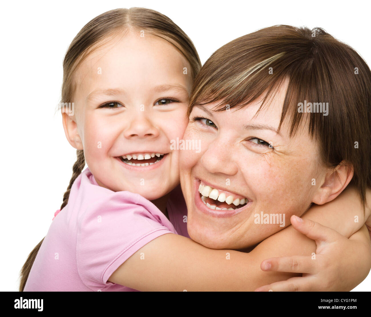 Portrait Of A Happy Mother Hugging Her Daughter Isolated Over White