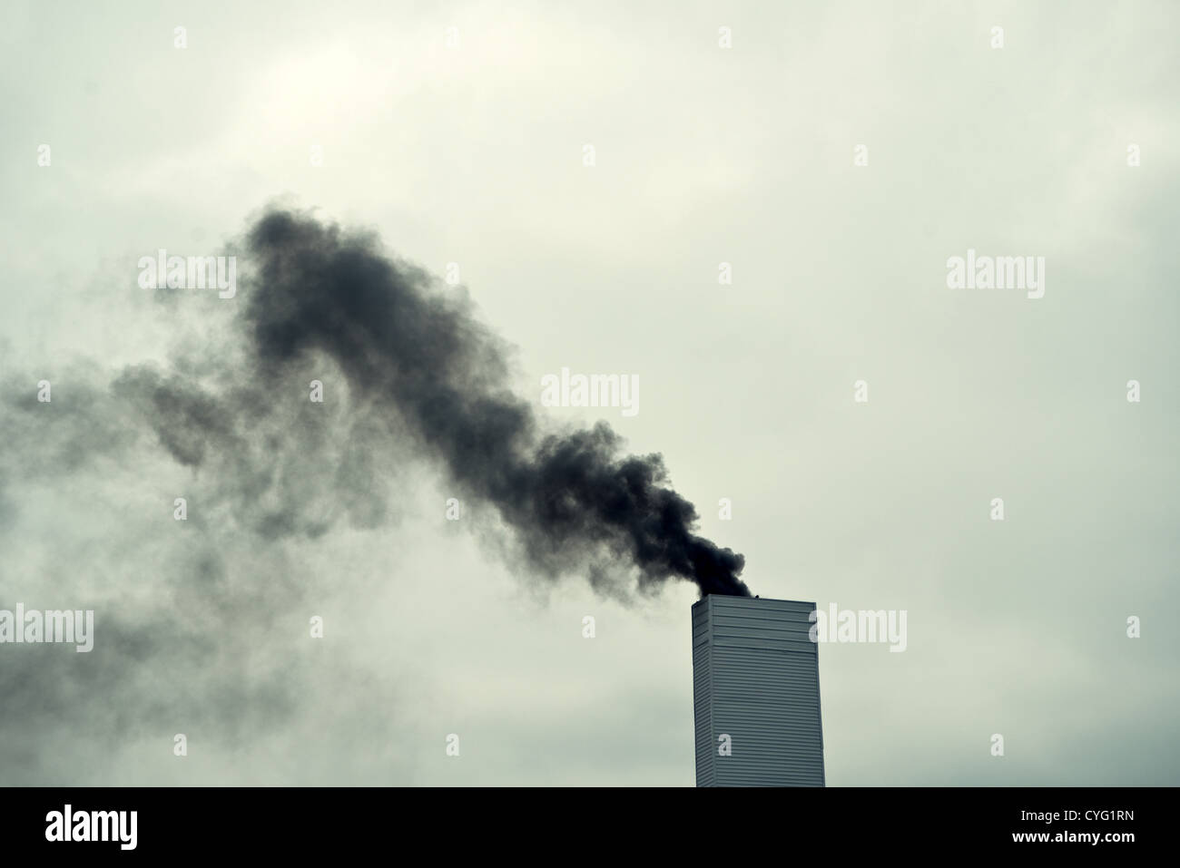 Dark black smoke from chimney hi-res stock photography and images - Alamy