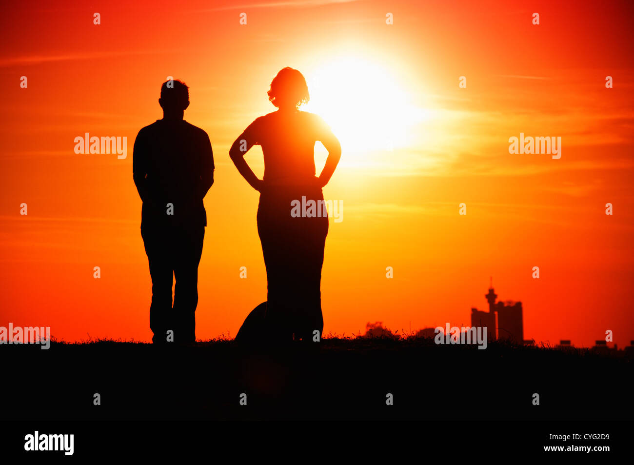 Couple sungazing, men and woman performing a sun meditation Stock Photo ...