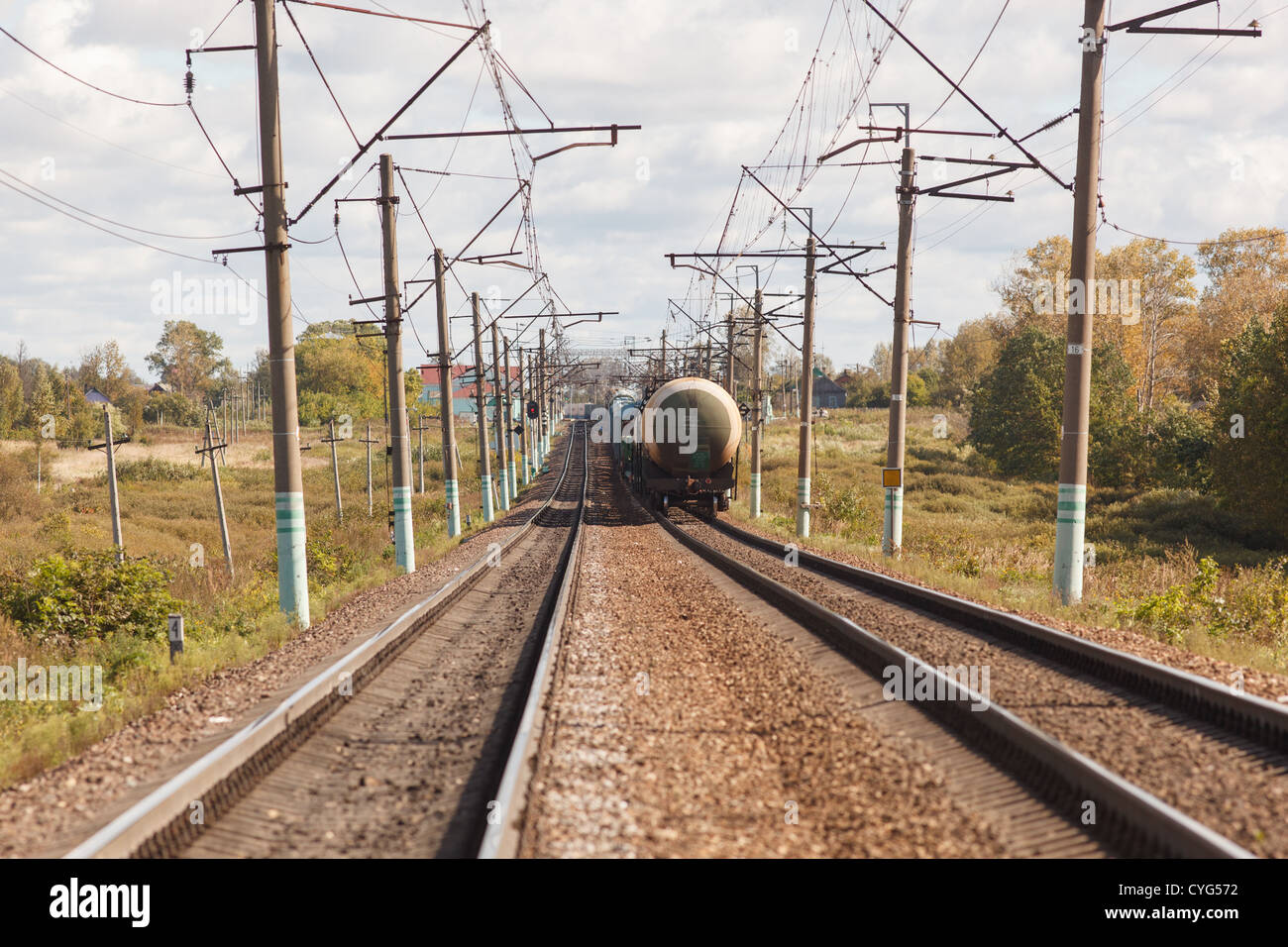 Railway in a summer field Stock Photo - Alamy