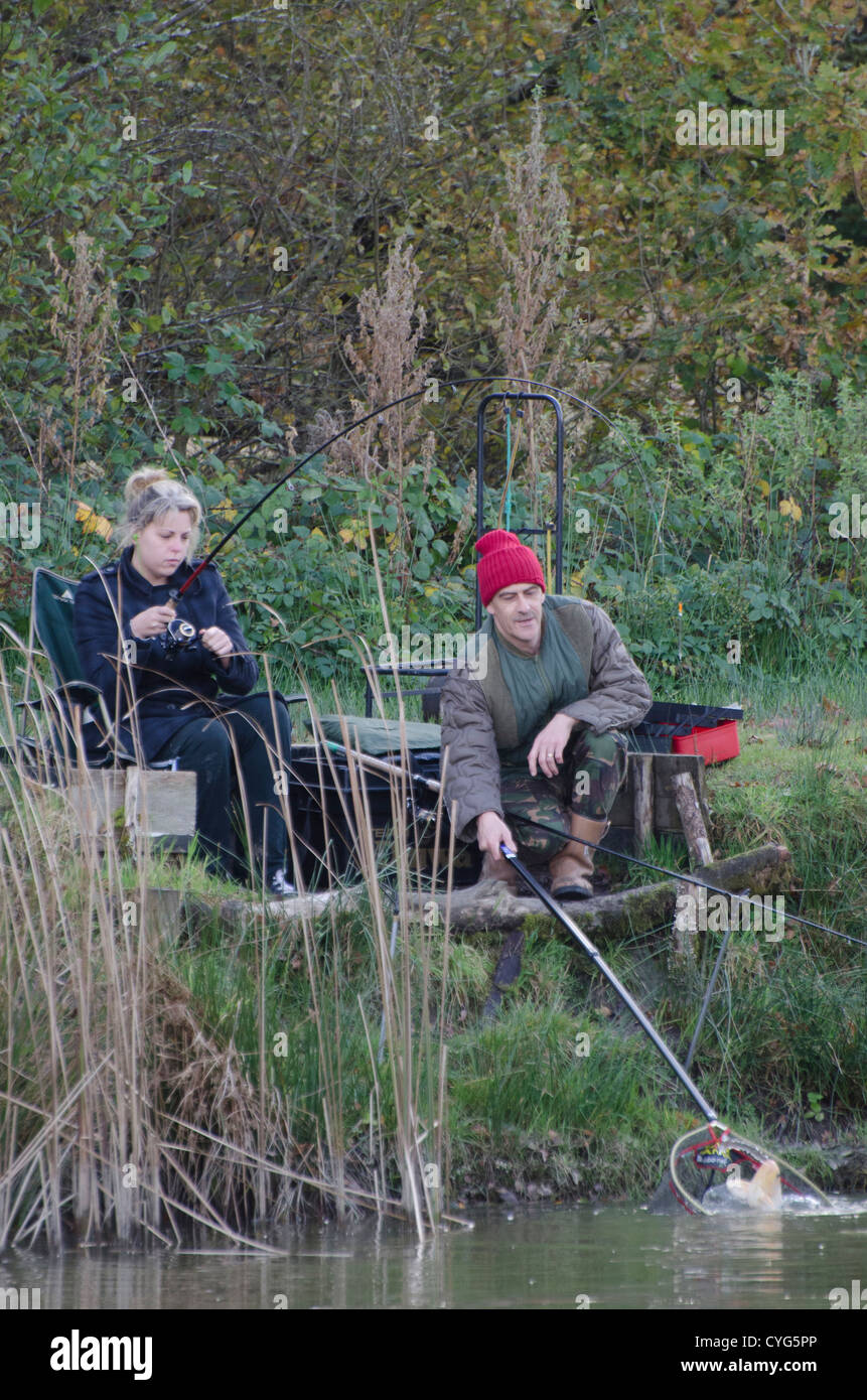 Team work when fishing Stock Photo - Alamy