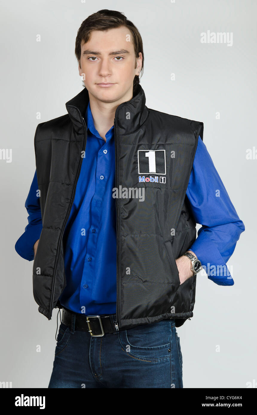 Mobil 1. Man - Promotional clothing fashion shoot in studio Stock Photo ...