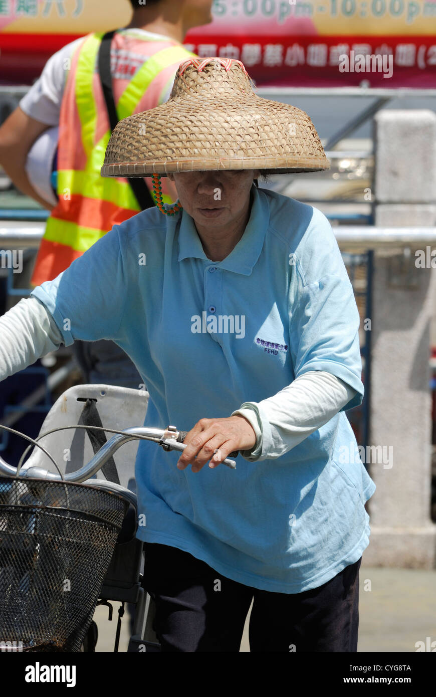 Asian women wearing a traditional weaved hat Stock Photo - Alamy