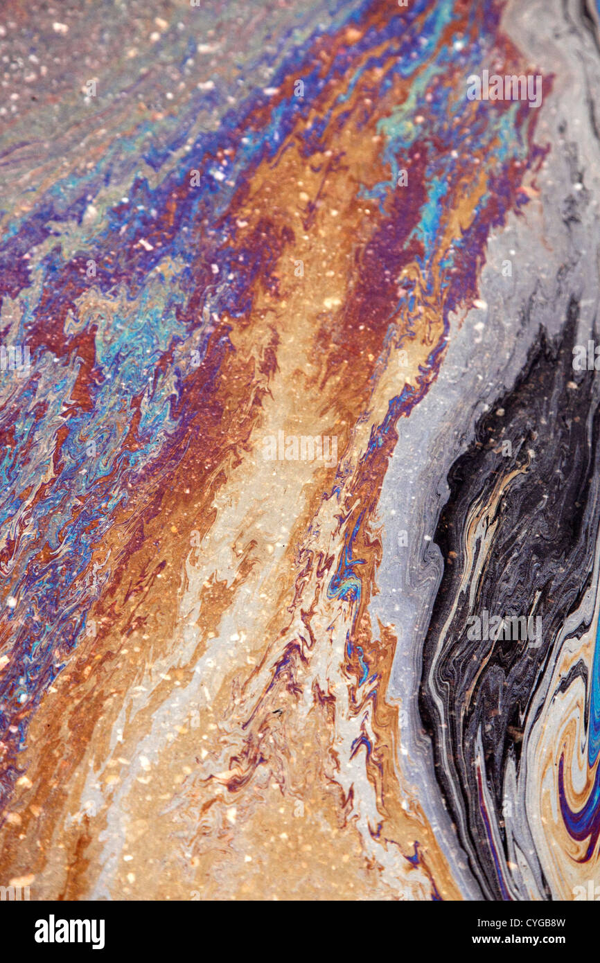 oil spill on the ground of a petrol station Stock Photo - Alamy
