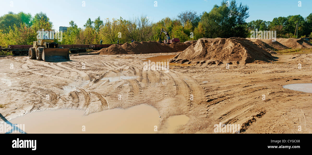 Industrial area with construction sand Stock Photo - Alamy