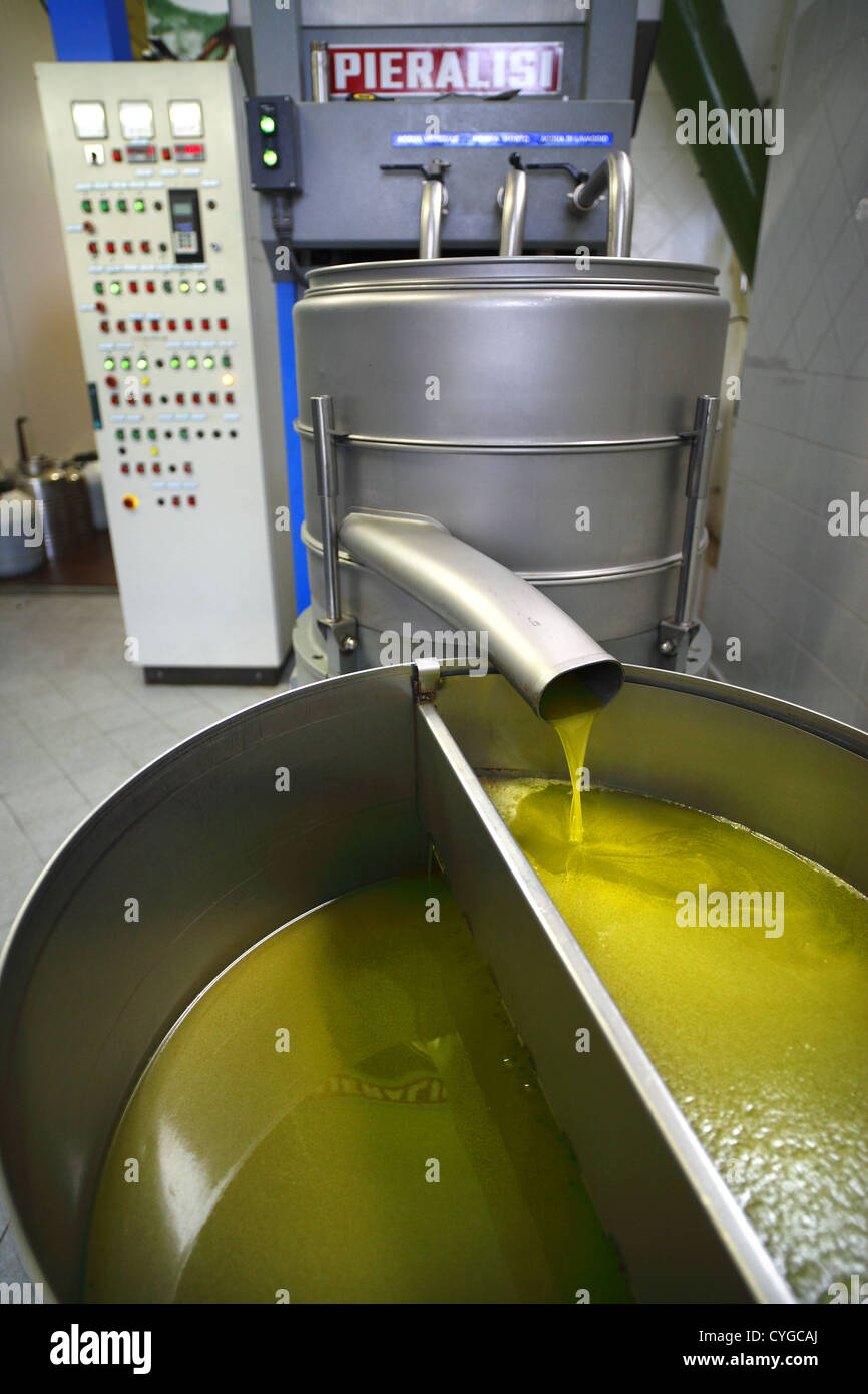 Olive oil pressing italy hi-res stock photography and images - Alamy