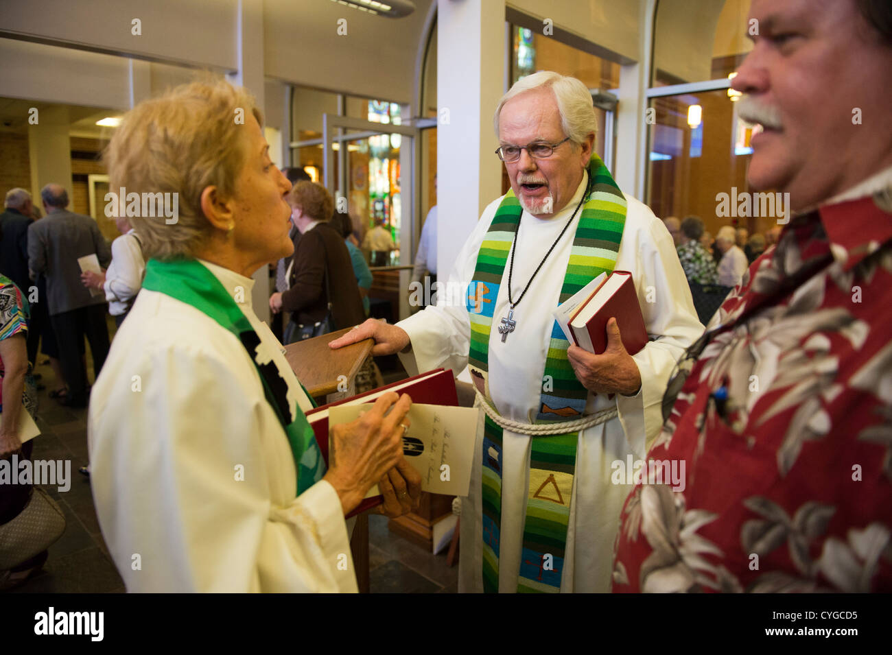 Pastors talk in narthax after service at St. Martin's Lutheran Church ...