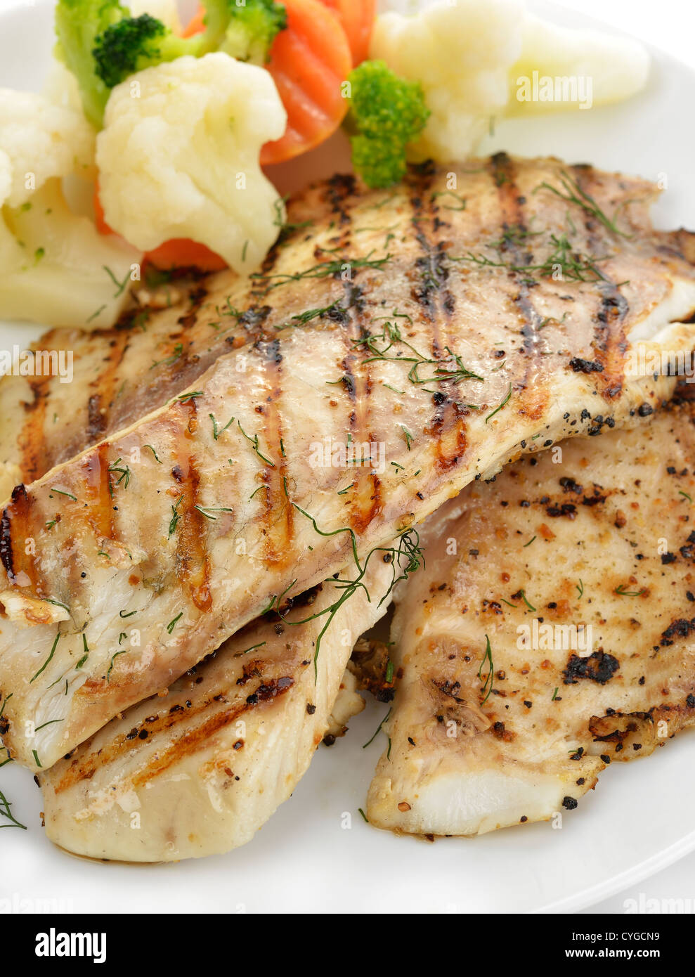 Grilled Fish With Vegetables,Close Up Stock Photo - Alamy