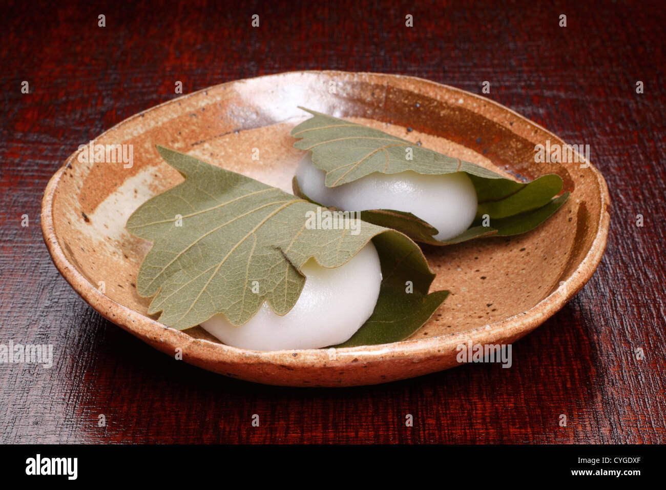 Japanese style rice cake wrapped in Oak leaves Stock Photo - Alamy