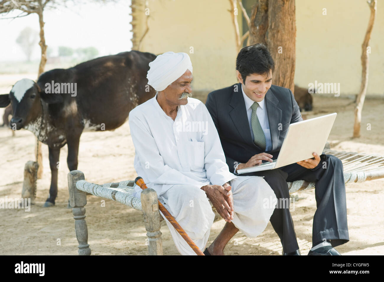 Financial advisor explaining to a farmer about agriculture loan Stock ...