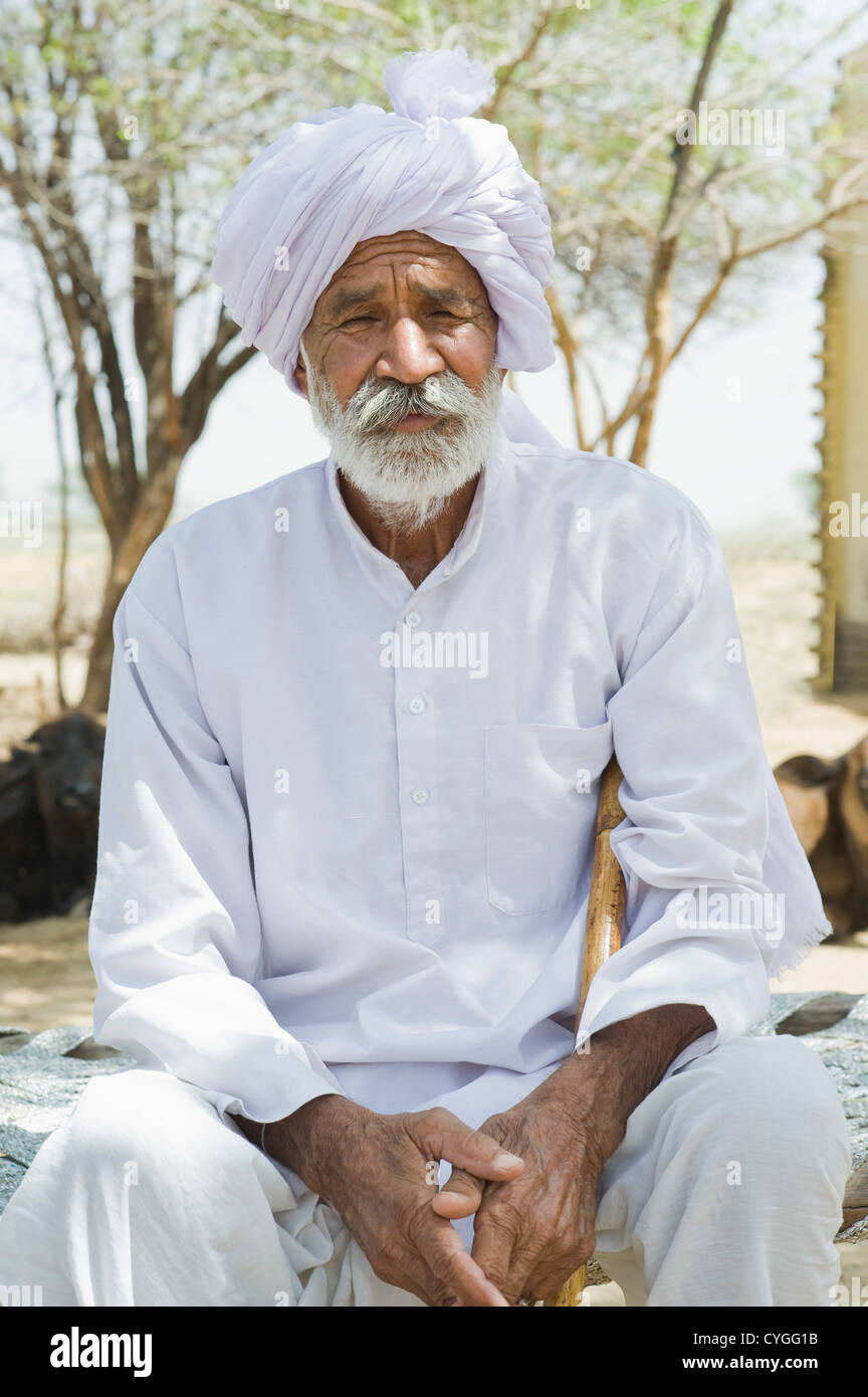 Indian rural farmer man sitting hi-res stock photography and images - Alamy