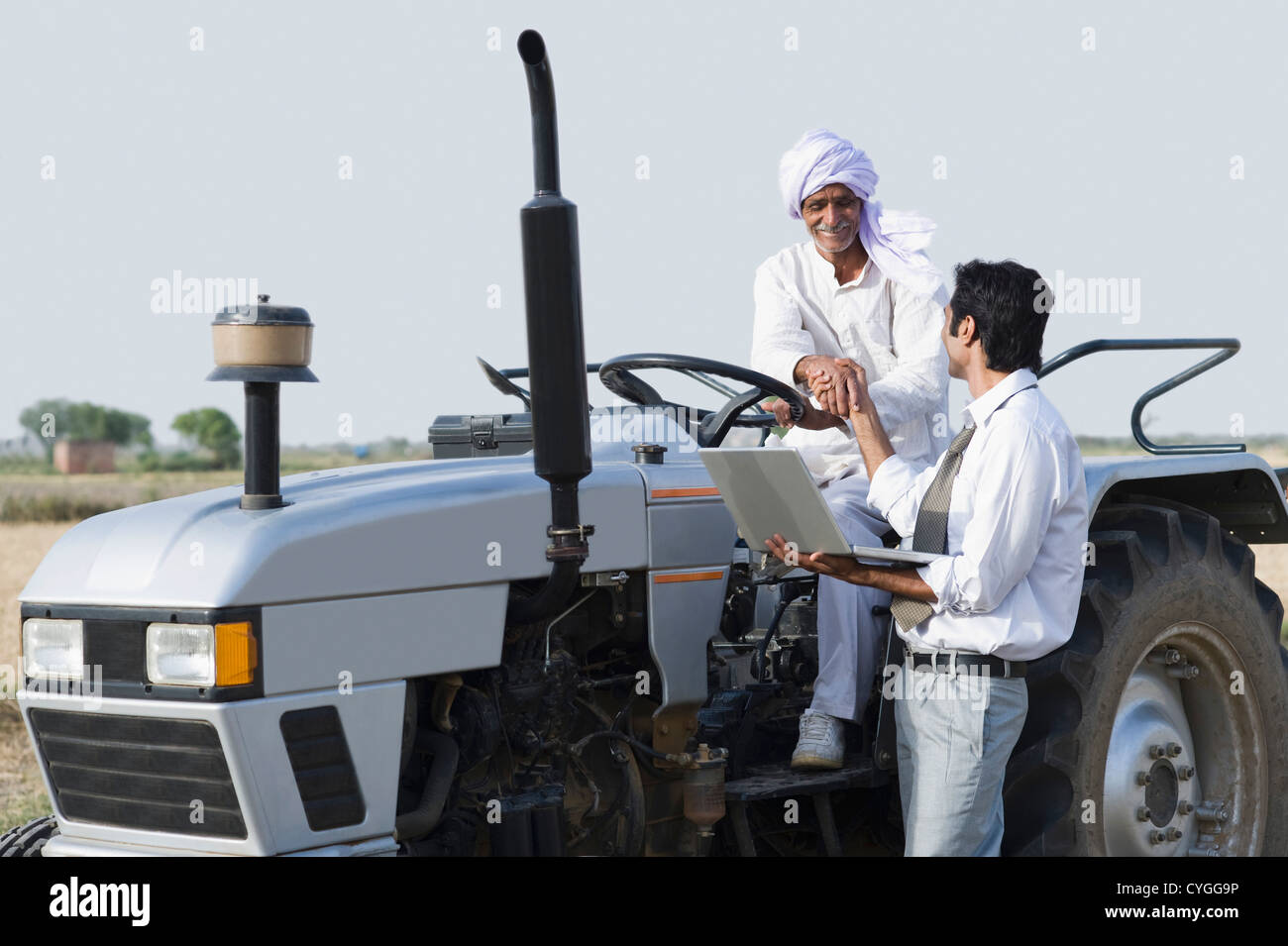 Financial advisor explaining to a farmer about agriculture loan Stock ...