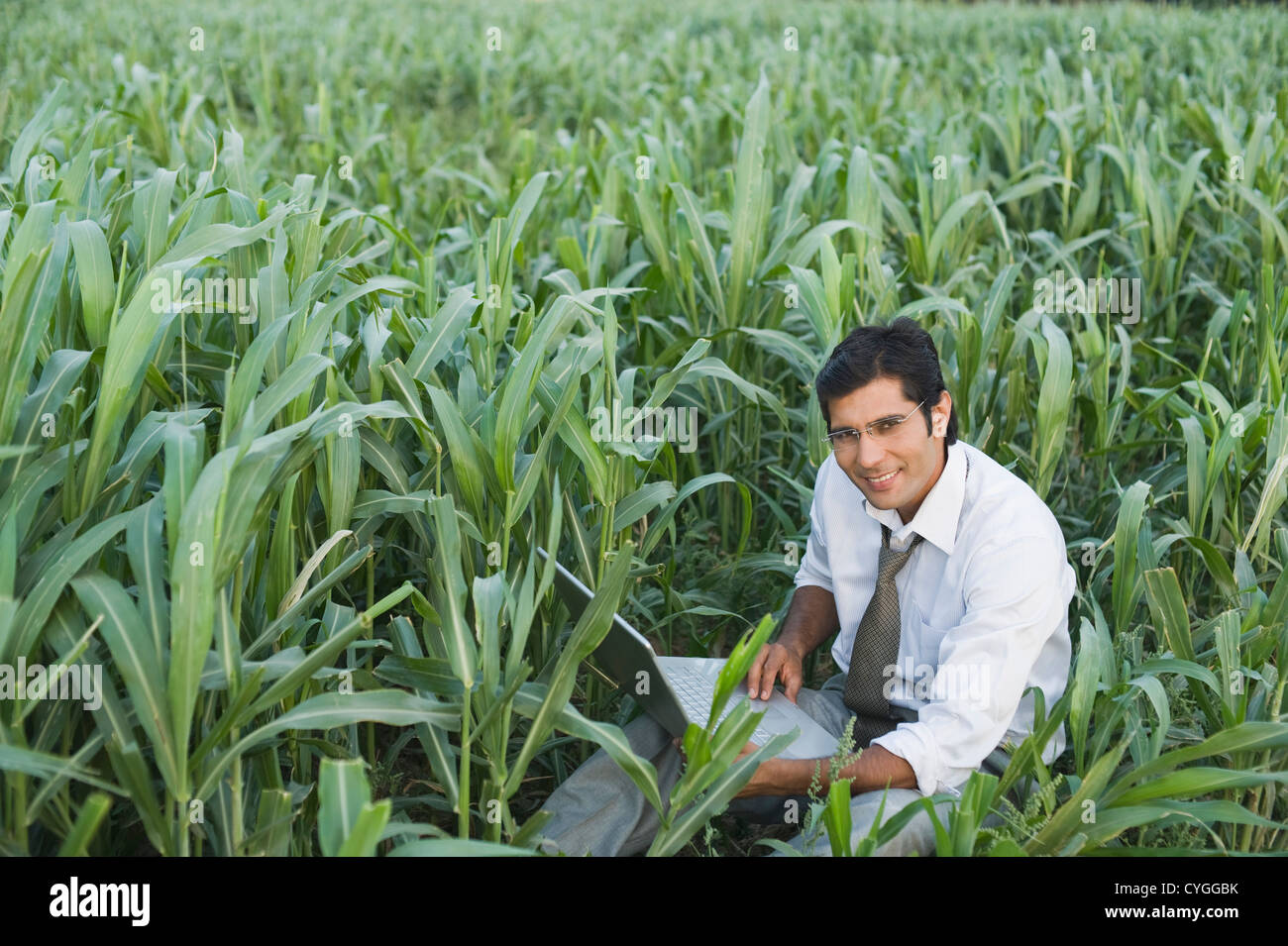 Using laptop indian village hi-res stock photography and images - Alamy