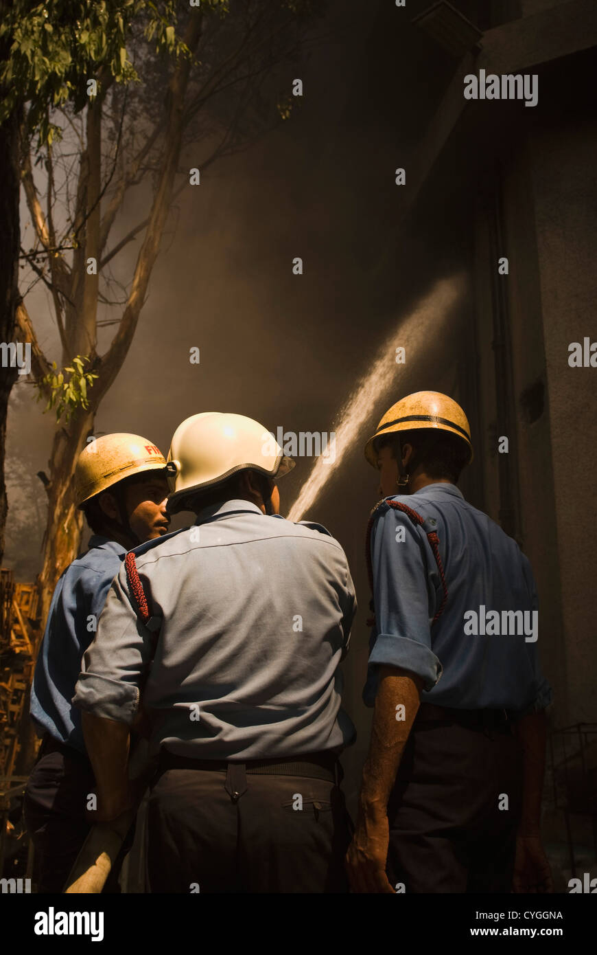 Firefighters during a rescue operation, Gurgaon, Haryana, India Stock ...