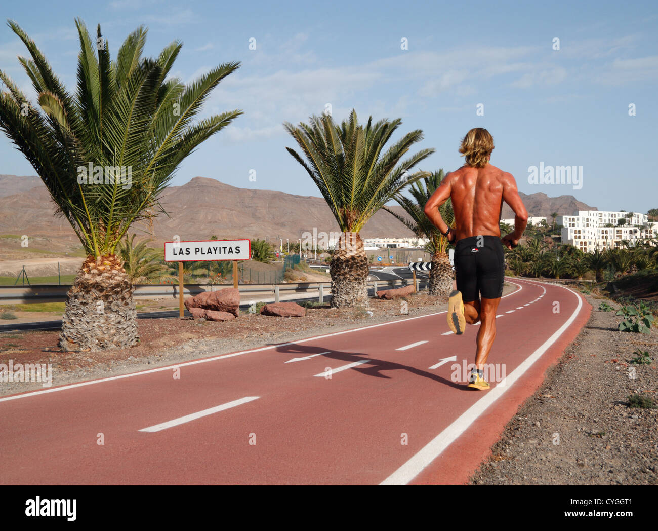 Man running on cycle path High Resolution Stock Photography and Images ...
