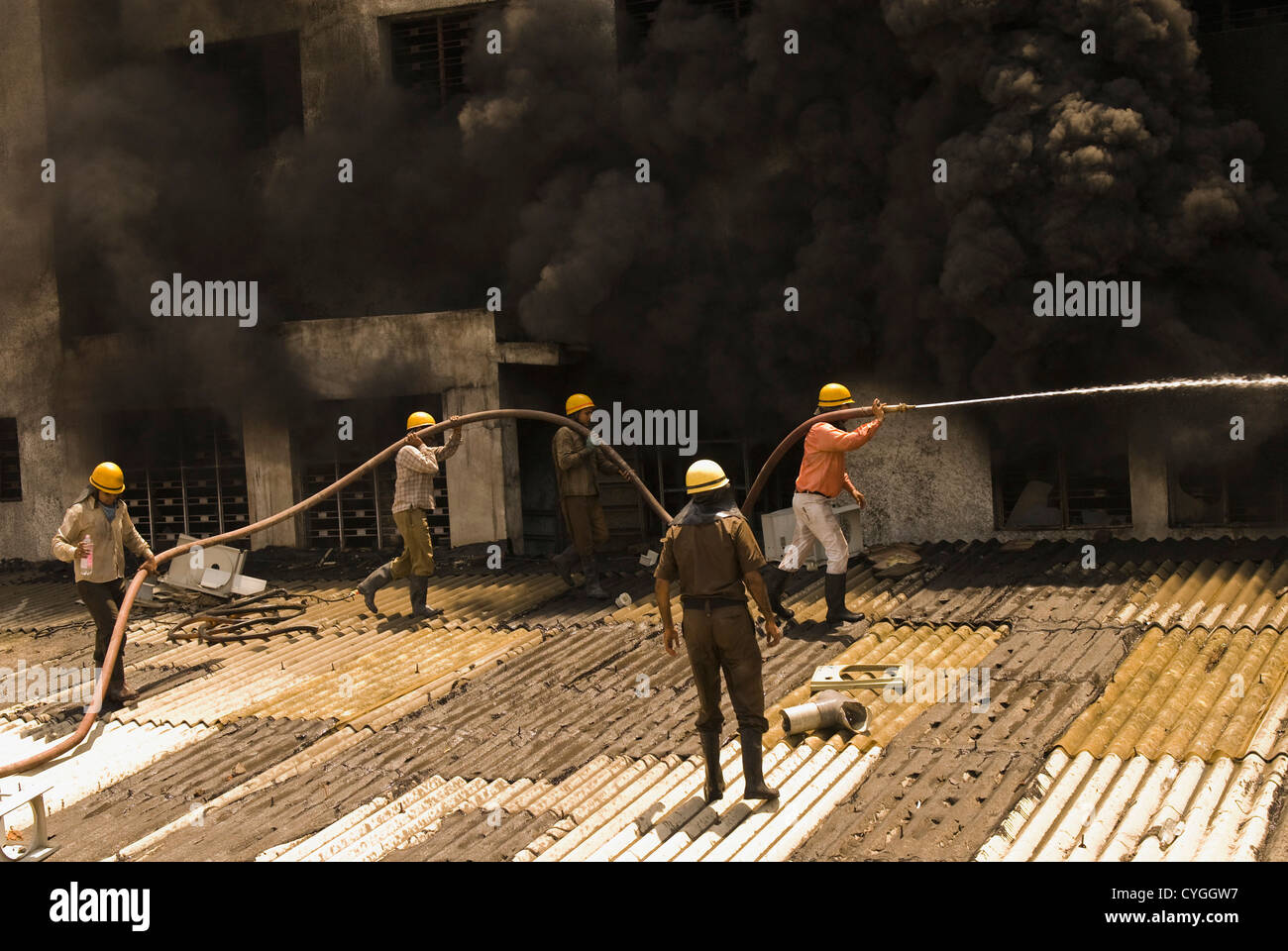 Firefighters during a rescue operation, Gurgaon, Haryana, India Stock ...