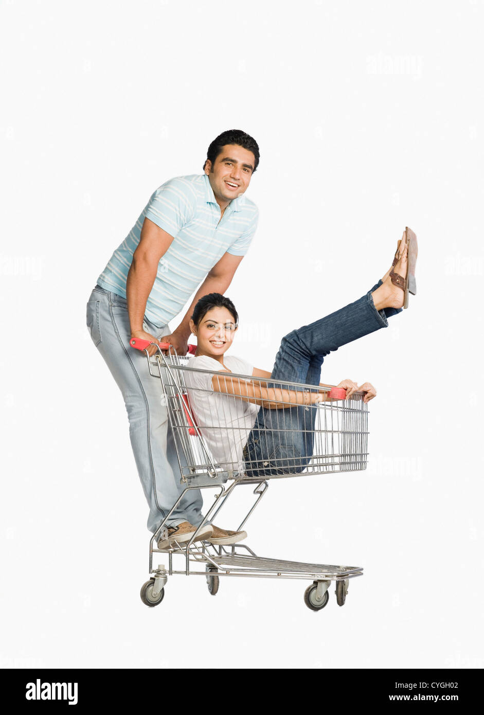 Woman pushing shopping cart side view hi-res stock photography and ...