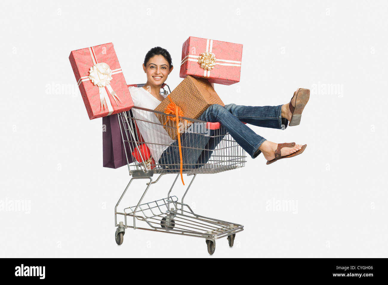 Woman shopping cart full money hi-res stock photography and images - Alamy