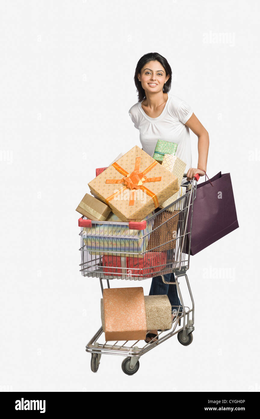 Woman pushing a shopping cart hi-res stock photography and images - Alamy